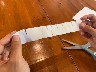 How to Put Your Head Through a Piece of Paper | The Art of Manliness